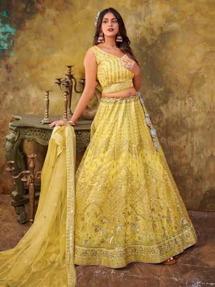 Lemon Yellow Hevay Zari Embroidered Lehenga Choli In Net